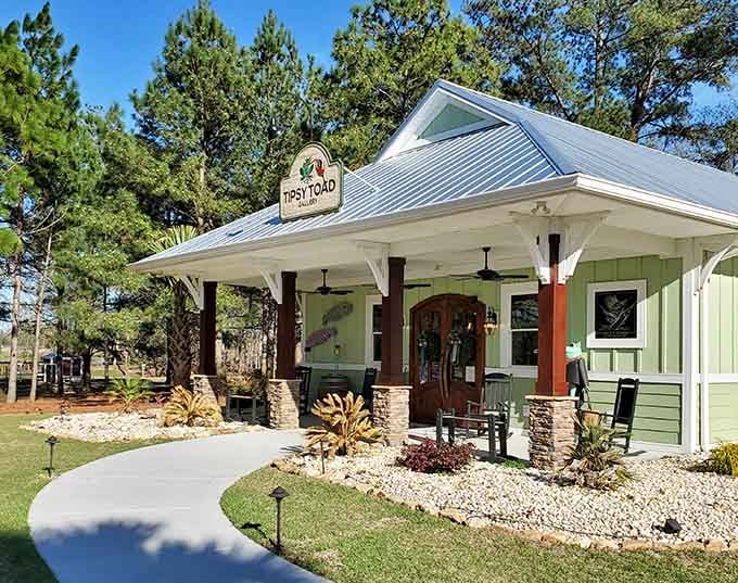 Tipsy Toad Gallery's cheerful green exterior and welcoming porch suggest art appreciation pairs nicely with Southern hospitality and relaxation.