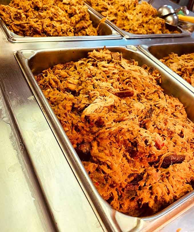 Pans of pulled pork this beautiful could make a vegetarian seriously reconsider their life choices.