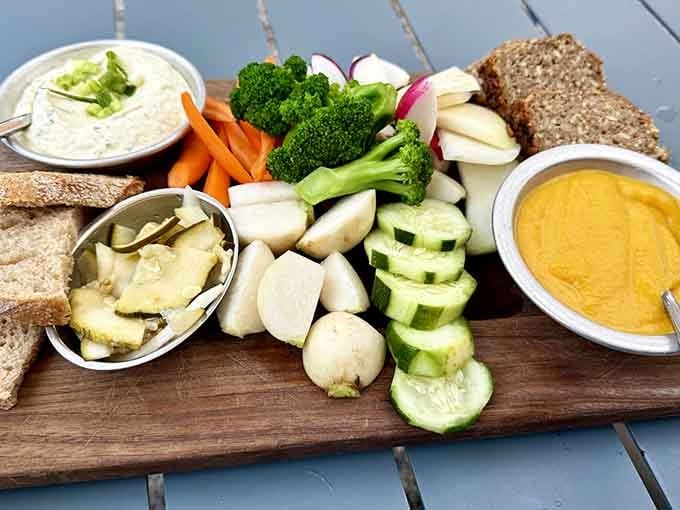 This charcuterie board showcases Farm Club's commitment to fresh vegetables, proving that raw produce can steal the show entirely.
