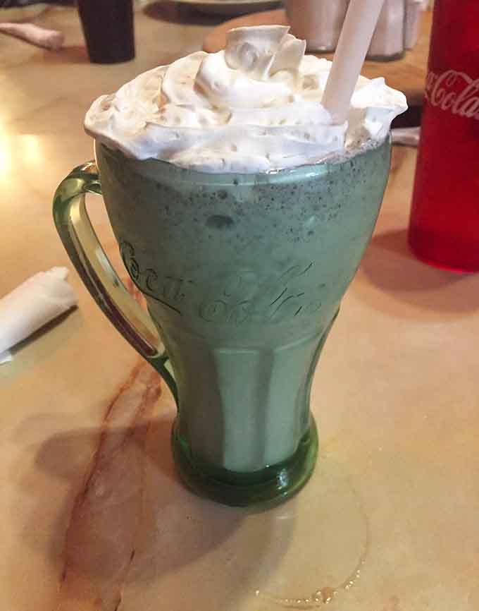 That mint-green Oreo shake isn't just dessert, it's a commitment to happiness served in vintage glassware.