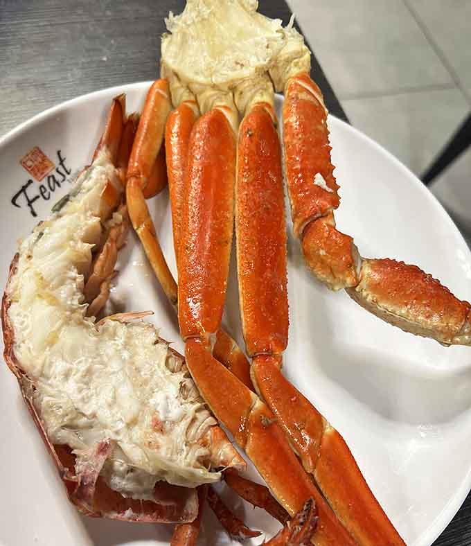 Crab legs and lobster tail on the same plate? This is living your best life, one crack at a time.