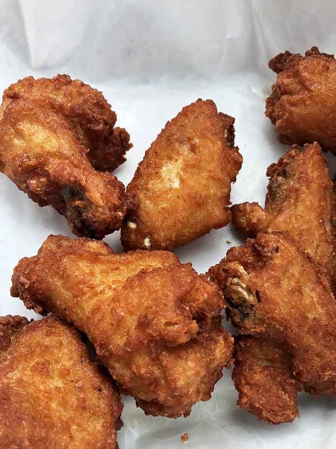Golden, crispy chicken wings that prove this seafood spot knows its way around a fryer with serious skill.