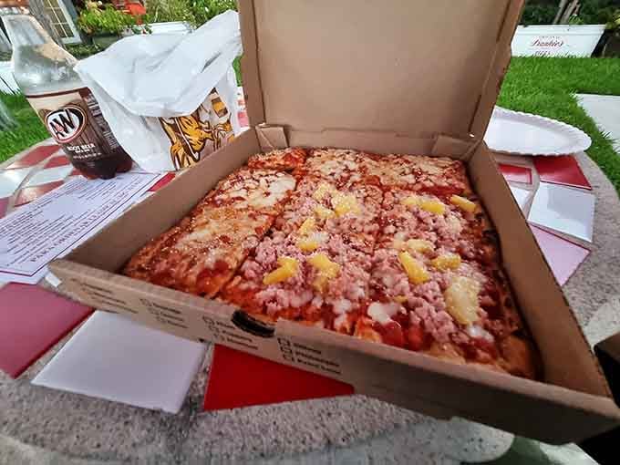 Hawaiian pizza done right, because sometimes pineapple and ham just belong together, controversy be darned.