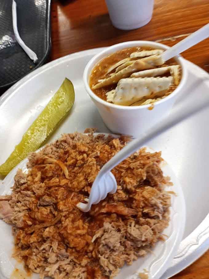 Pulled pork with Brunswick stew and a pickle spear, this is Georgia barbecue in its most honest and delicious form.