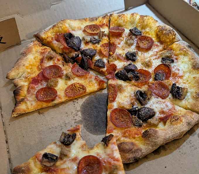 When pepperoni gets the wood-fired treatment, it curls up into crispy little cups of pure joy.