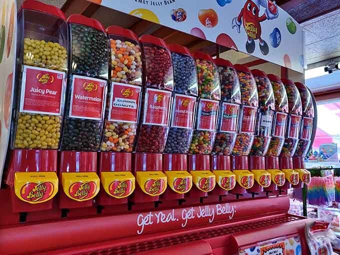The Jelly Belly wall of dispensers offers more flavor choices than most people make in an entire week of decisions.