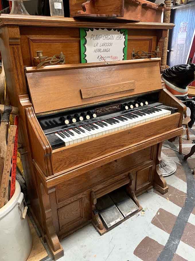 A pump organ that once filled parlors with music now waits to soundtrack someone's next chapter.