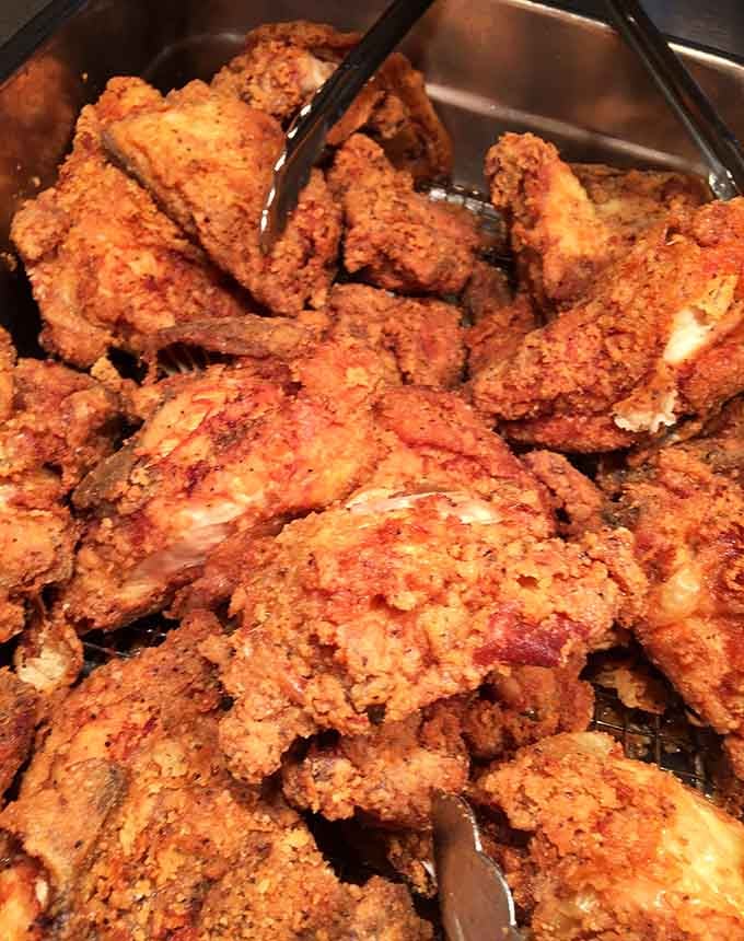 Golden, crispy fried chicken piled high like edible treasure&mdash;this is what buffet dreams are made of, folks.