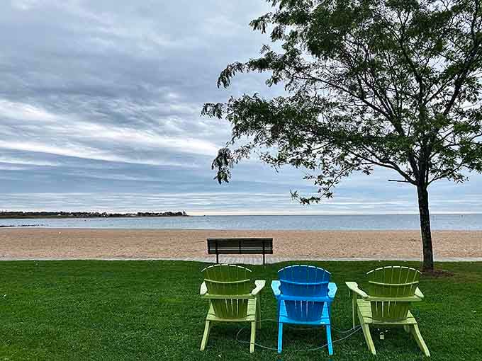 Adirondack chairs facing the Sound offer front-row seats to nature's daily performance of waves, sky, and serenity.