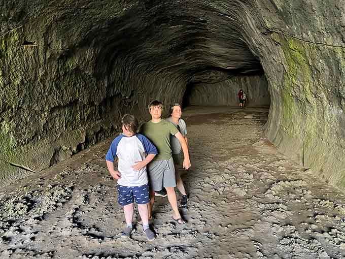 The lava tube's smooth walls tell stories of ancient fire, now hosting visitors in its surprisingly spacious chambers.