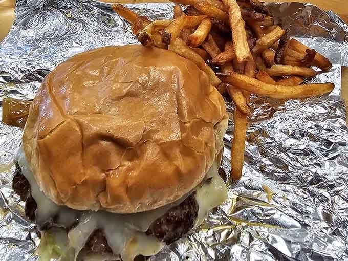 Behold the glistening glory of fresh beef meeting melted cheese, a love story told in foil and satisfaction.