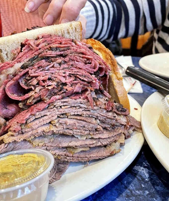 When your sandwich needs structural support just to stay upright, you know you've ordered correctly at Harold's.