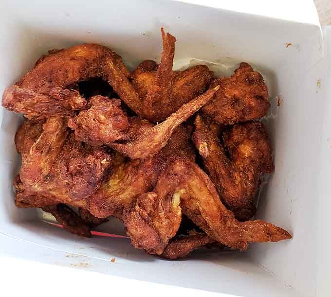 Golden, crispy, and glistening with promise, these wings have launched a thousand road trips across the state.