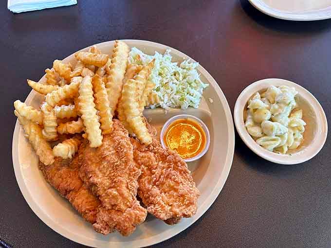 That perfectly crispy coating isn't trying to be trendy or fusion, just exceptionally good at being fried chicken.