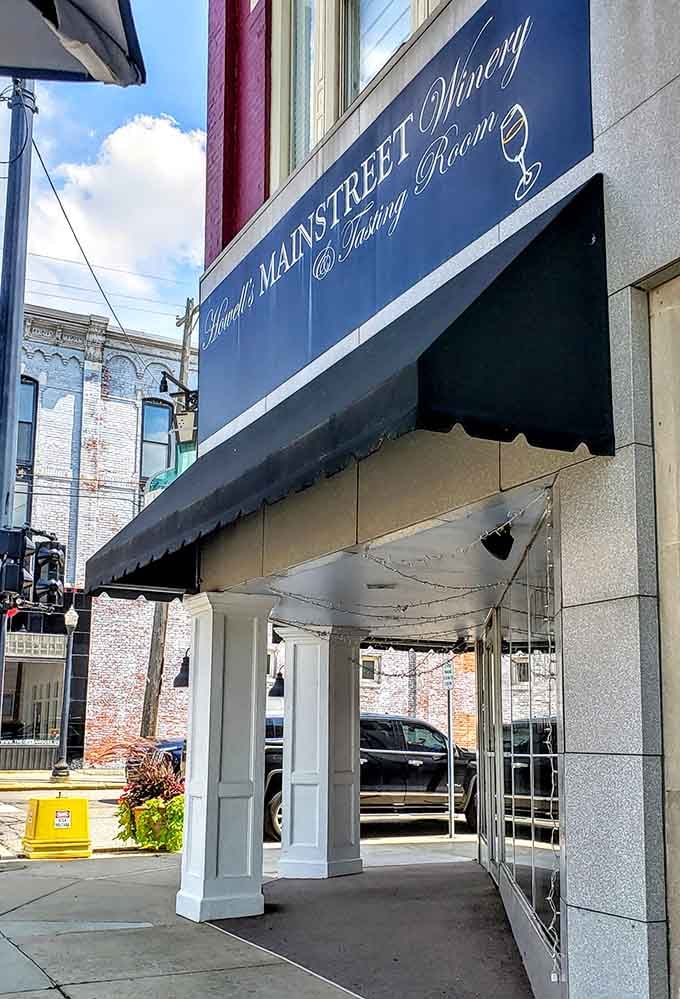 That elegant awning and classic storefront promise good times and even better wine waiting just inside those doors.