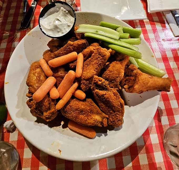 Golden, crispy perfection served with celery and carrots because we're all about balance, right?