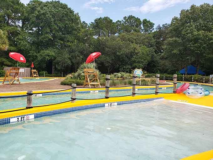 The lazy river winds through landscaped beauty, proving that sometimes the slow lane is exactly where you want to be.