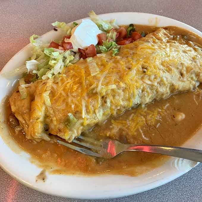 That golden chimichanga sits in a pool of sauce like a delicious island you'll happily get stranded on.