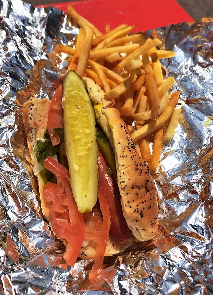 Behold the Chicago-style hot dog in all its glory, wrapped in foil like a gift you give yourself.