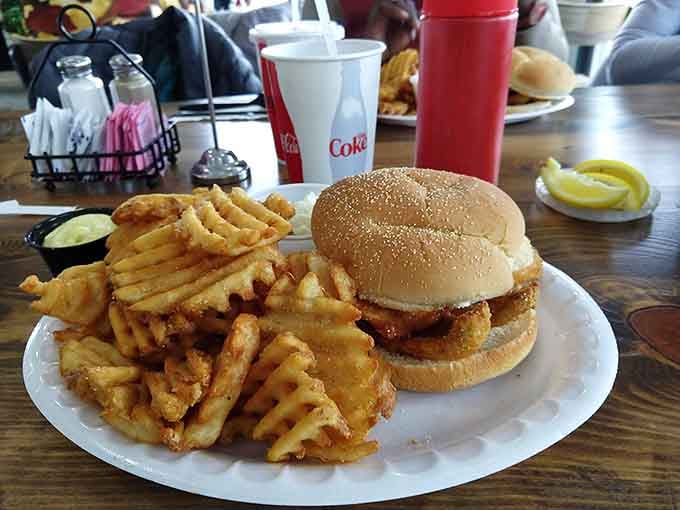 That perch sandwich with waffle fries is basically a love letter to Lake Erie.