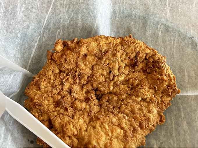 Behold the golden-crusted beauty that makes grown adults plan road trips and cancel other dinner plans immediately.