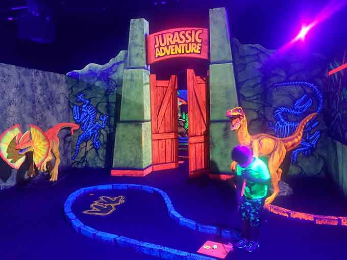 Black light transforms ordinary mini golf into something magical, where neon dinosaurs guard every challenging hole with prehistoric authority.