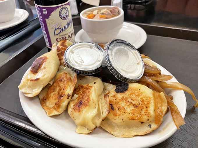 Golden, crispy, and topped with caramelized onions, these pierogies are what dreams are made of, friends.