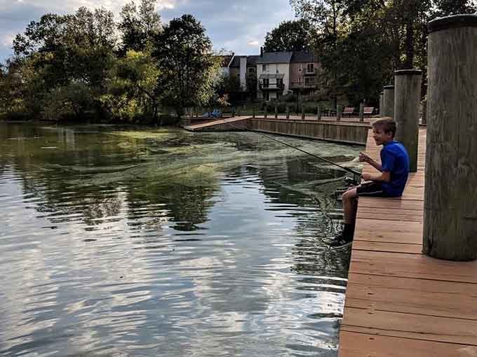A young angler learns patience one cast at a time, because some life lessons come with a fishing pole.
