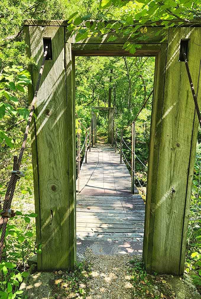 This charming footbridge proves that getting there really is half the fun on these wooded trails.