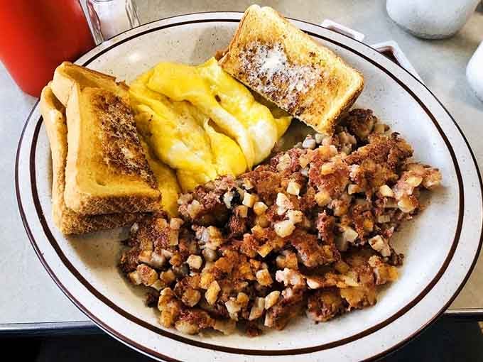 Golden corned beef hash piled high beside fluffy eggs proves some traditions never go out of style, just out of stock.