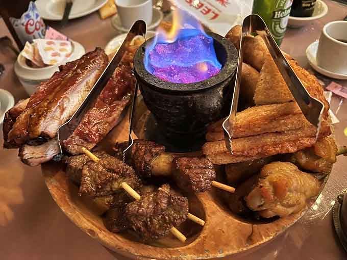 The flaming pupu platter arrives like it's headlining a luau, complete with enough sizzle to make everyone turn and stare.