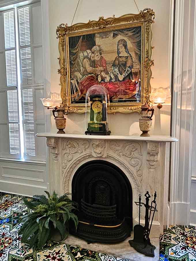 This ornate marble fireplace with its gilded tapestry above makes your electric space heater look positively embarrassing by comparison.