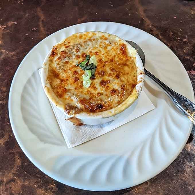 Behold the golden-topped masterpiece that's been making people reconsider their soup loyalties since day one.