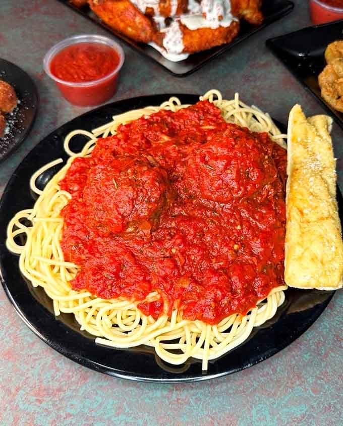 Spaghetti and meatballs so generous, you'll wonder if they're trying to feed your entire extended family.