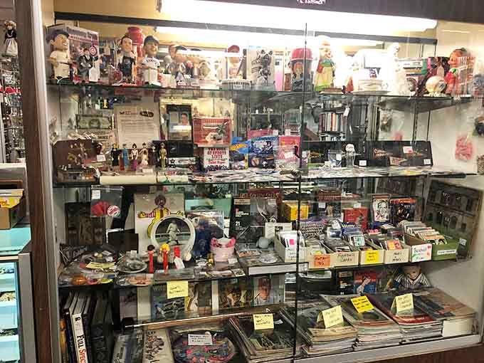 That display case holds more nostalgia than your entire childhood photo album, and it's all for sale.