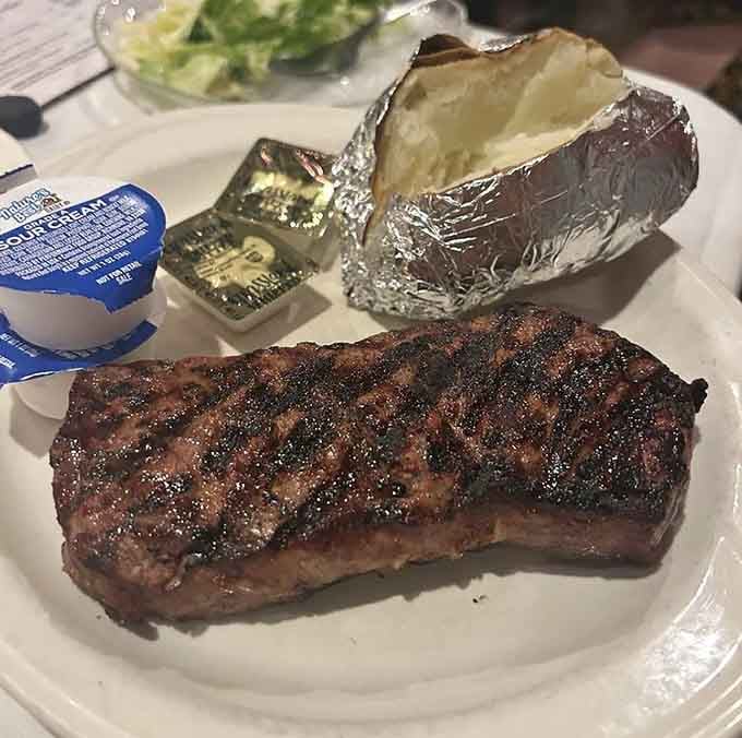 That charred crust on the strip steak could make a vegetarian reconsider their entire life philosophy.