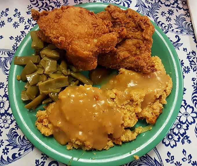 Golden perfection on a plate. This is what fried chicken dreams are made of, folks.
