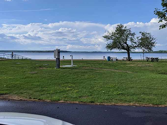 The St. Lawrence River stretches wide and peaceful, reminding you why waterfront property doesn't require a mortgage.