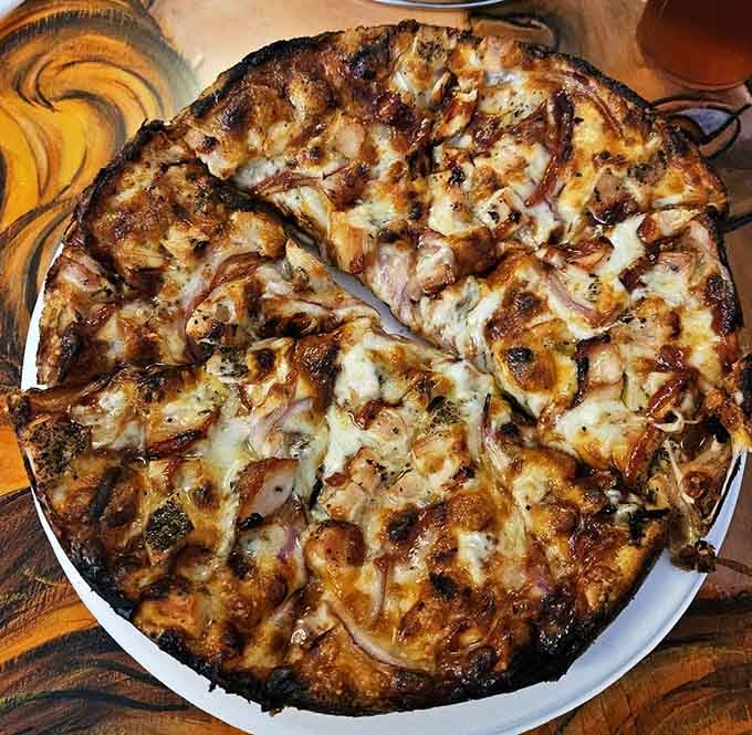 BBQ chicken pizza with that signature cheese-under-sauce construction that makes Matthew's legendary in Baltimore and beyond.