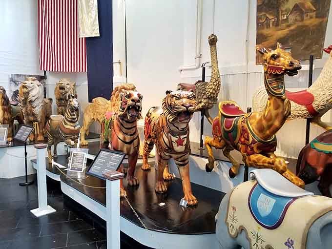 Tigers and giraffes join the menagerie because apparently horses alone weren't exciting enough for carousel designers.
