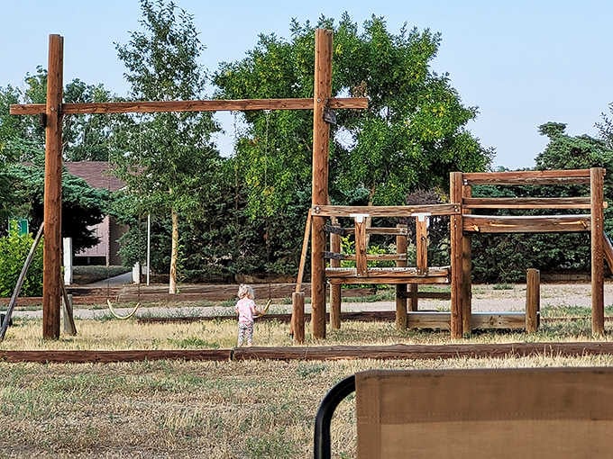 The playground equipment here has a different vibe when you remember what used to be underground.