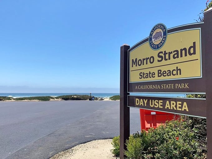 That welcoming sign promises exactly what it delivers: uncomplicated access to three miles of California coastal perfection.