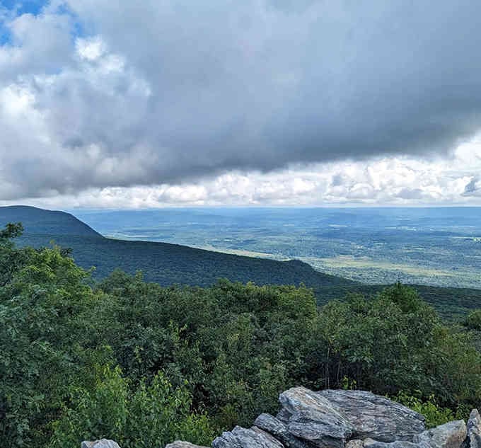When the clouds part and reveal this vista, you'll understand why people climb mountains in the first place.