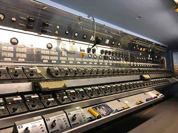 The control room looks like NASA mission control had a baby with a 1960s recording studio&mdash;pure vintage magic.