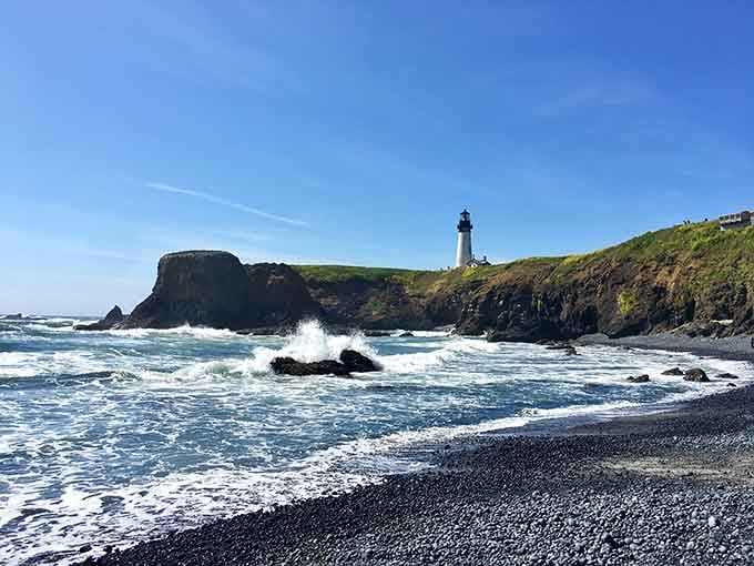 That lighthouse has been photobombing perfect beach shots since before your great-grandparents owned a camera.