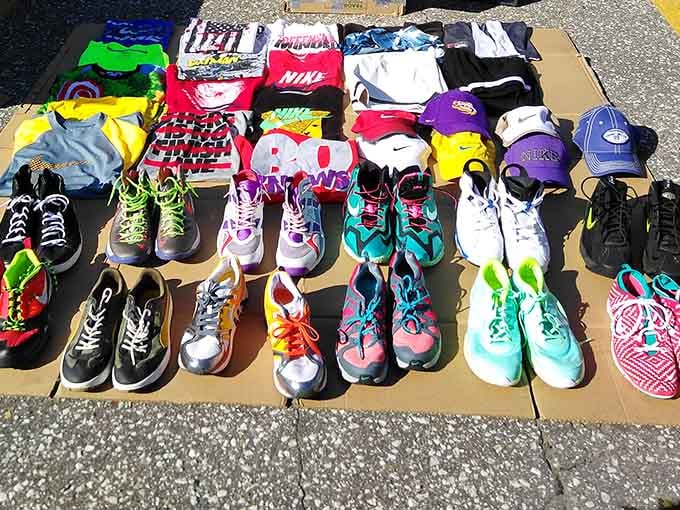 Colorful sneakers and branded apparel spread out like a rainbow of retail therapy waiting to happen here.