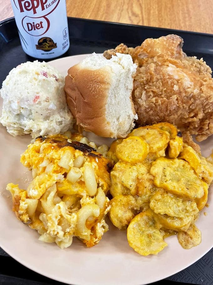 Golden fried chicken, fluffy biscuits, and sides that could make a grown person weep with joy.