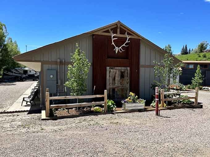 This barn-style building with elk antlers proves that mountain architecture doesn't need to try too hard to be charming.