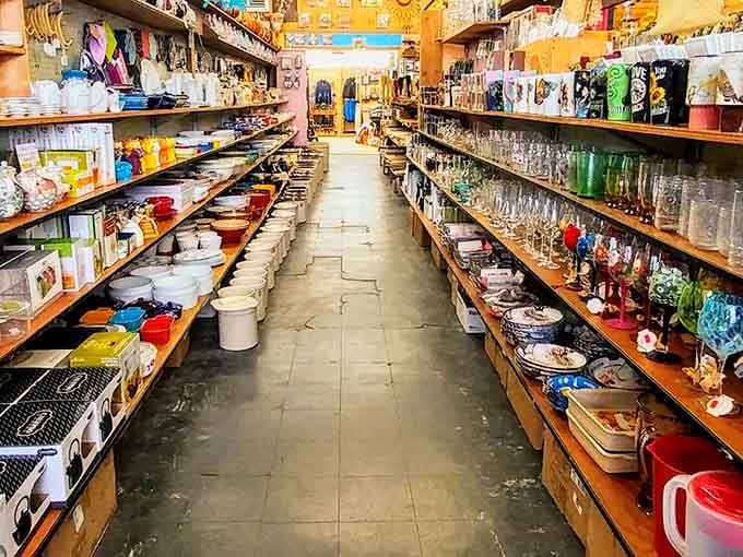 An aisle where kitchenware and practical goods coexist peacefully, like a United Nations of useful things.