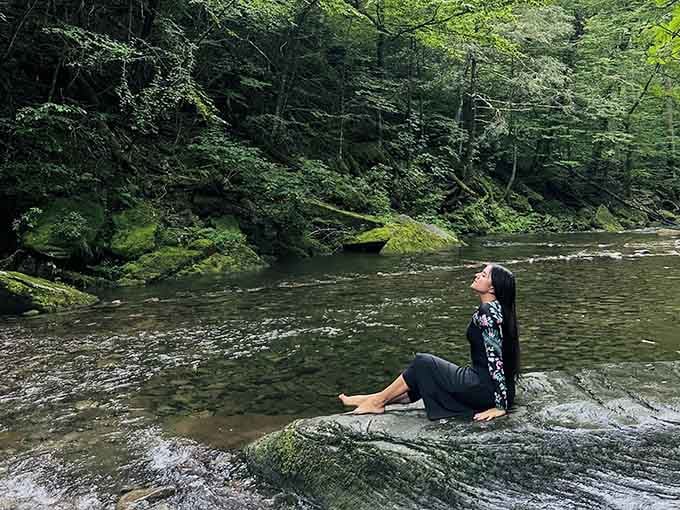 Finding your zen on smooth bedrock while surrounded by forest, this is retirement goals personified.